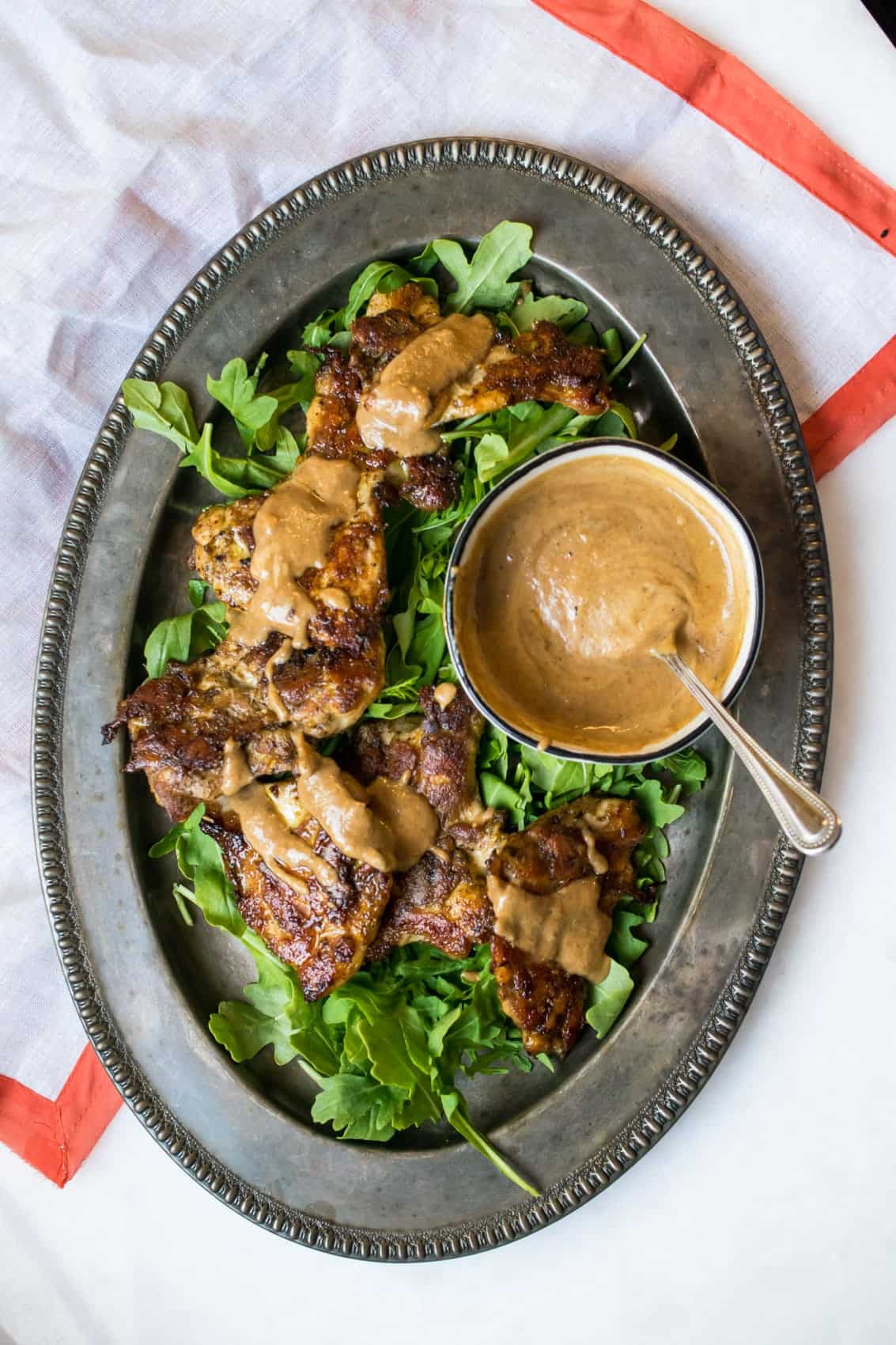 Cacao Butter Romesco Sauce with Crispy Chicken Thighs